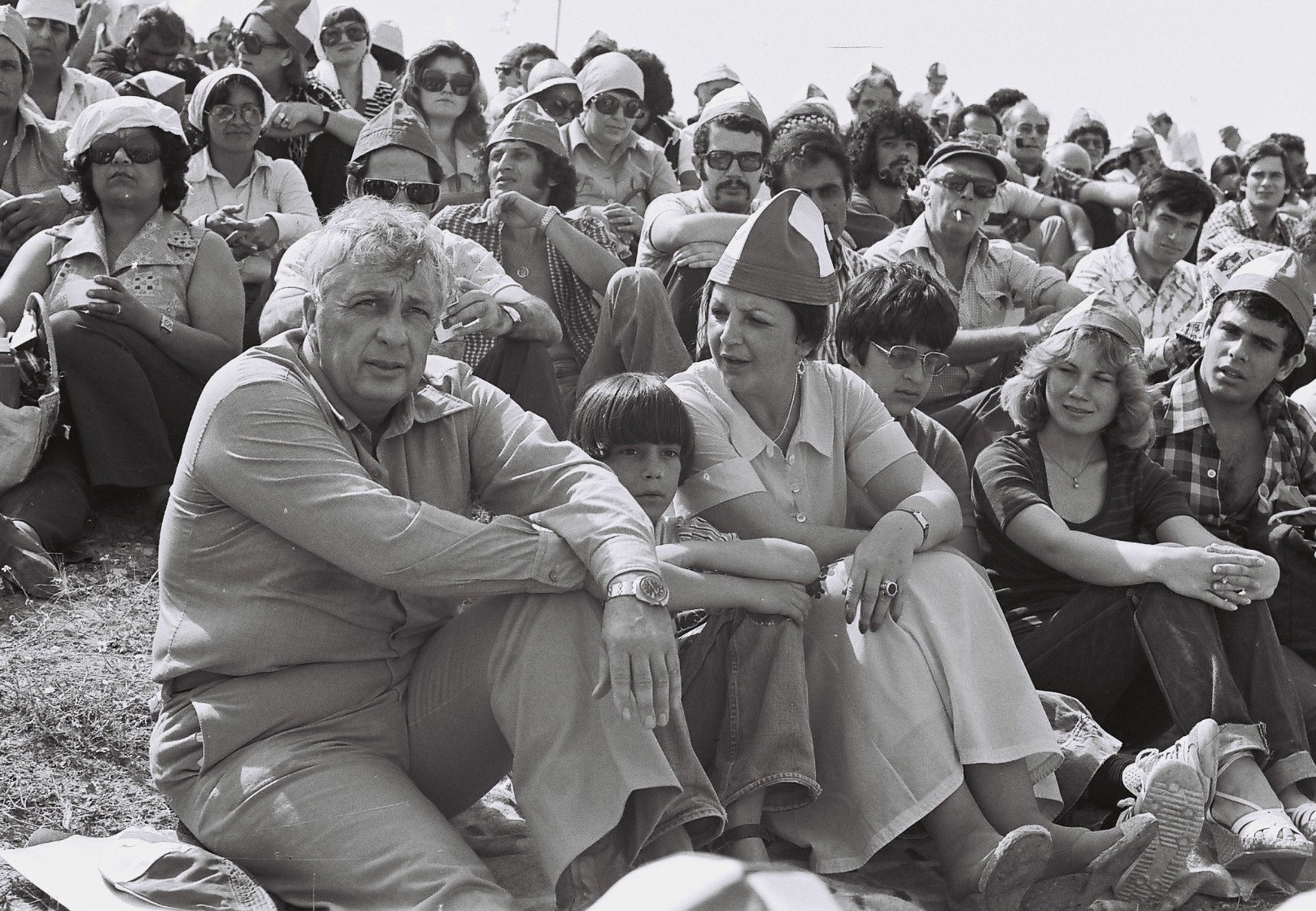 File photo of Ariel Sharon sitting with his wife and children during an ...